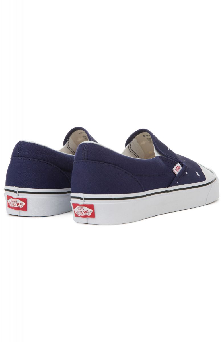 VANS The x Peanuts Classic Slip-On in Charlie Tree VN0A38F7QQF-BLU ...